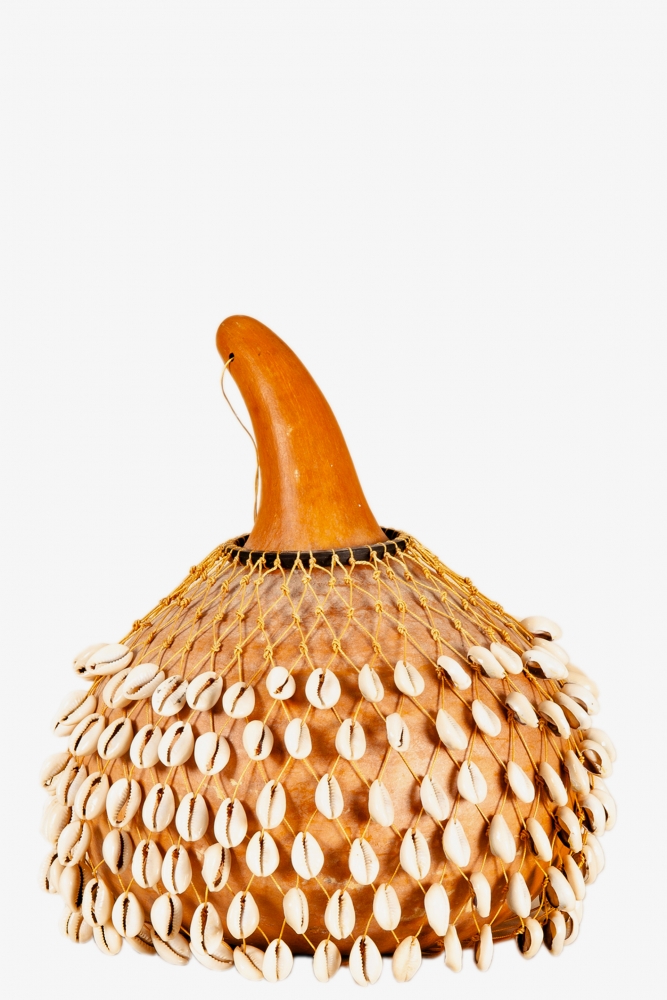 Gourd adorned with shells